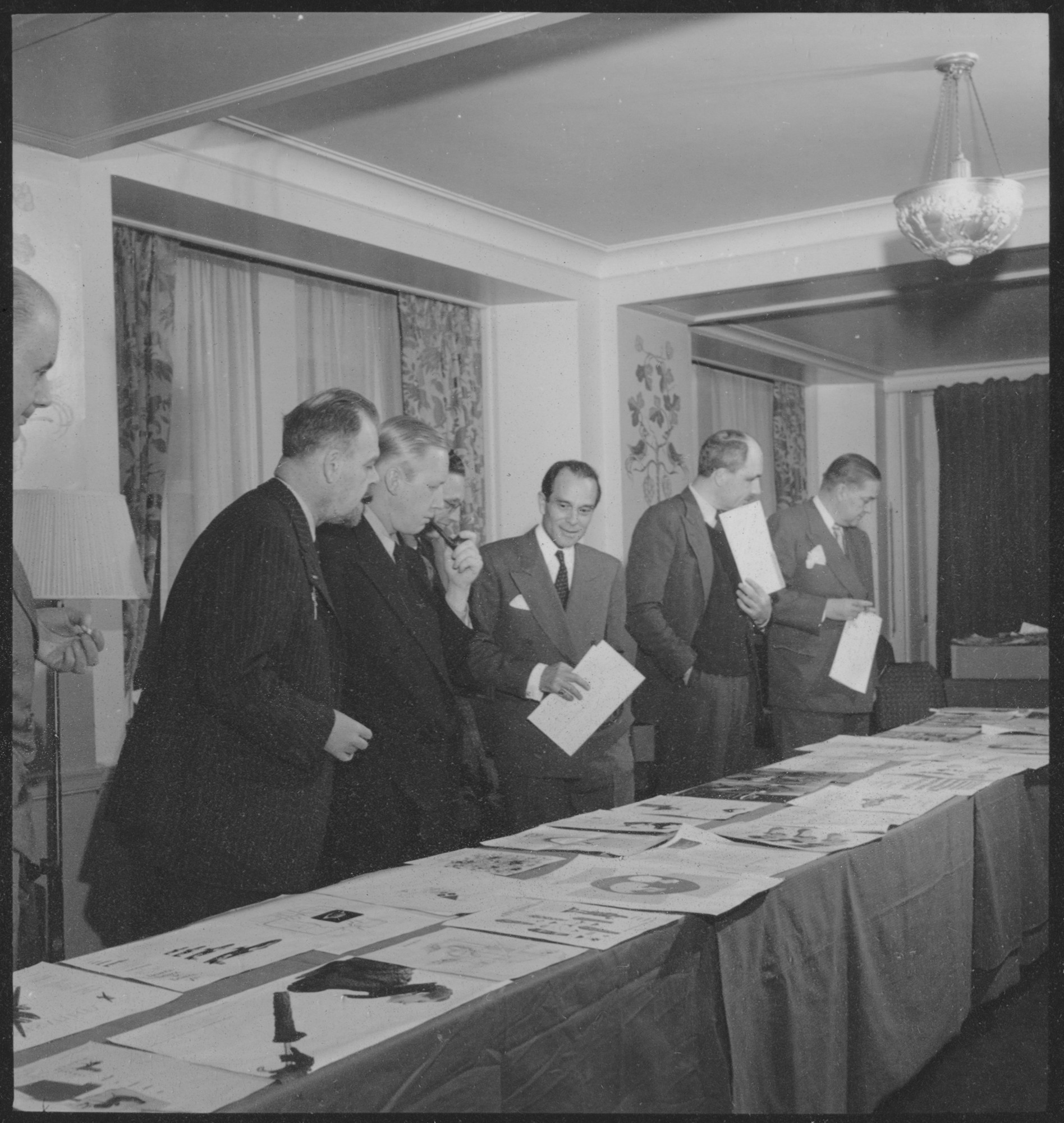 Left to right: Will Burtin, Henry-Russell Hitchcock, Frank Stanton ...