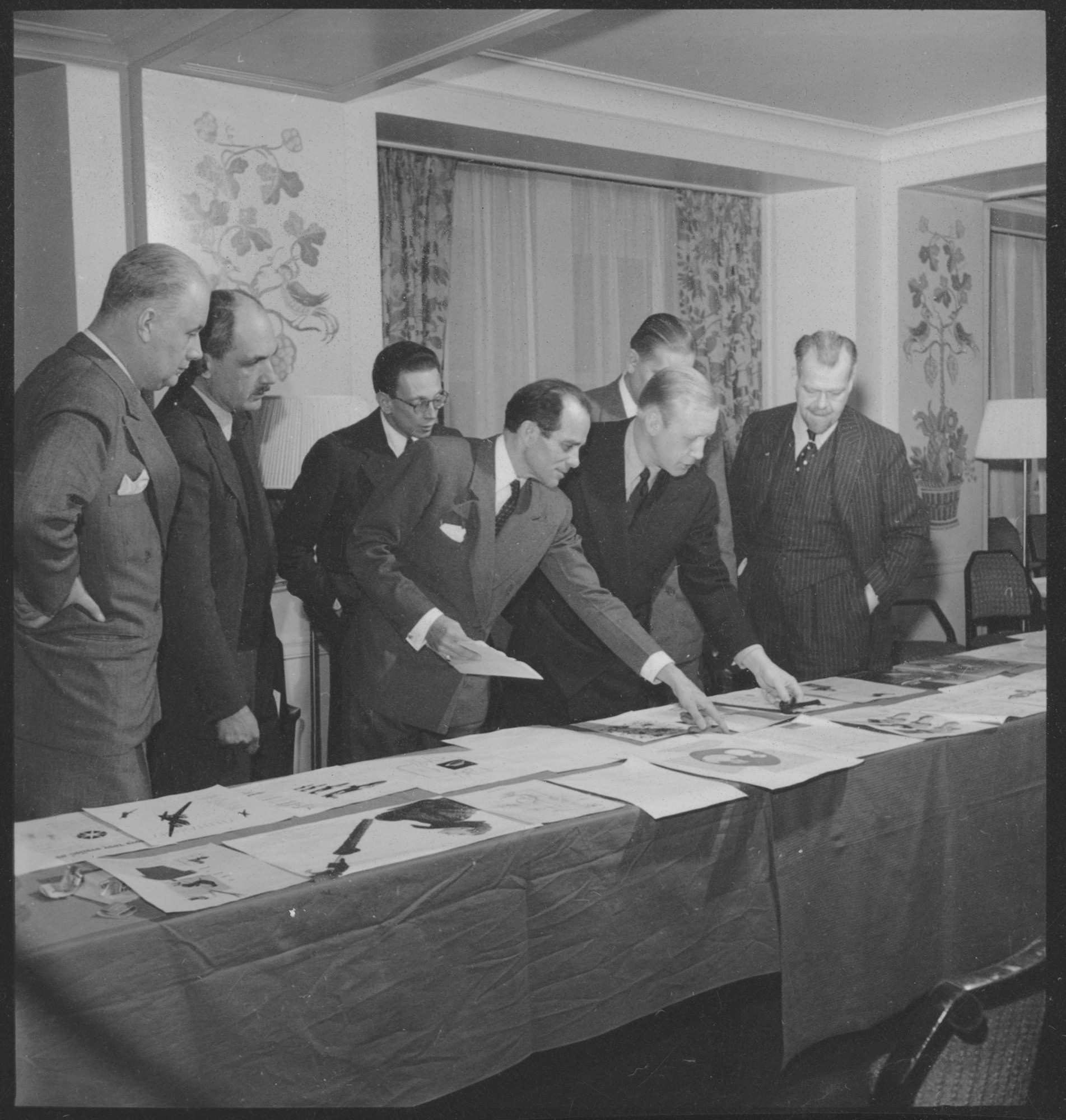 First row: (left to right) Will Burtin, Charles T. Coiner, Monroe ...