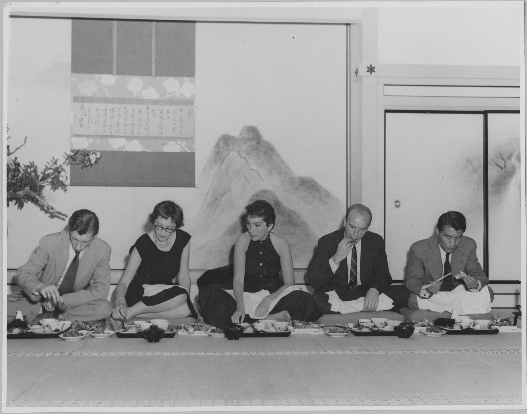 "Meal after ridge beam ceremony. Left to right: Mr. Drexler, Mrs. Shaw ...