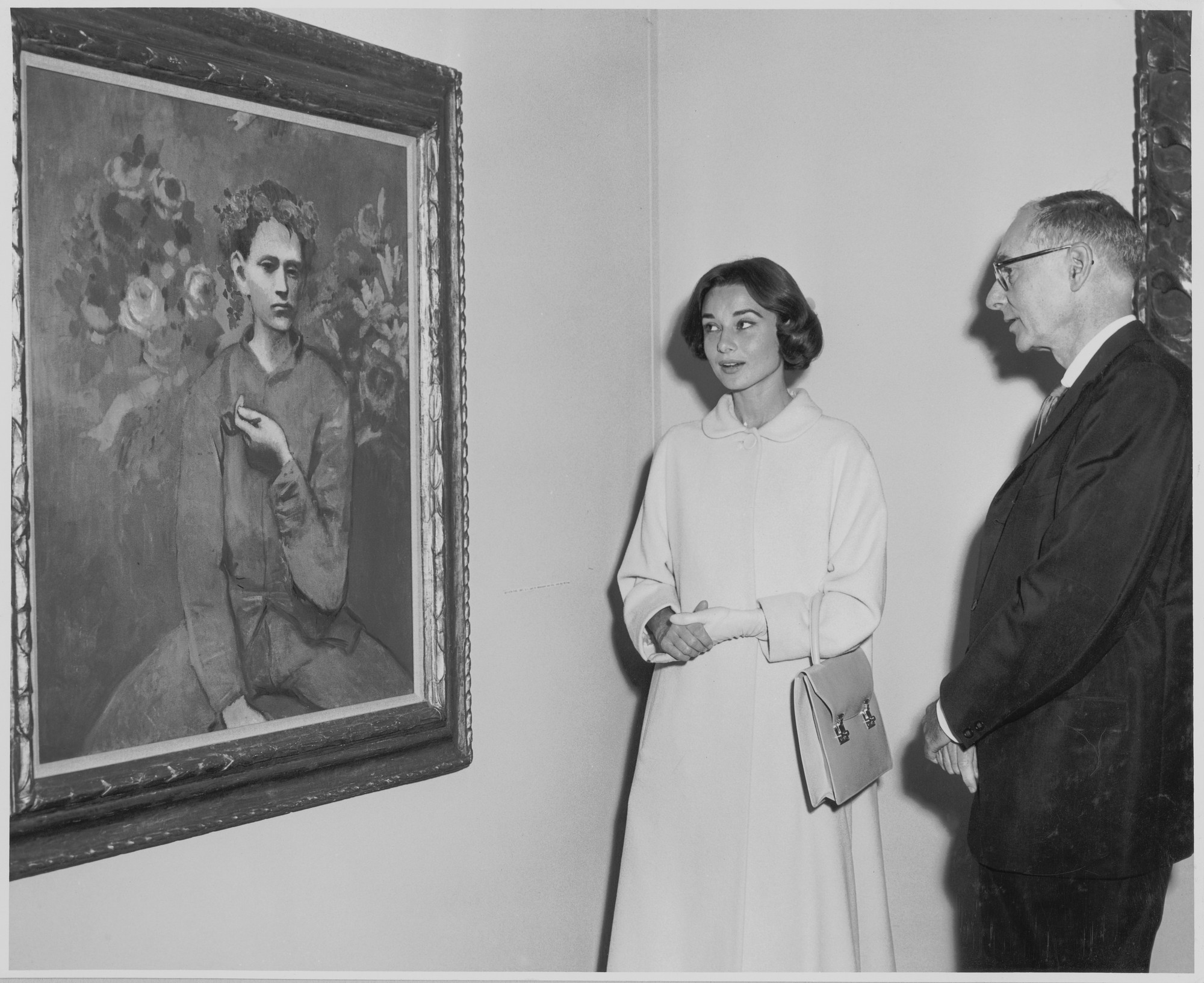 Audrey Hepburn and Alfred H. Barr, Jr. at the exhibition "Picasso: 75th ...