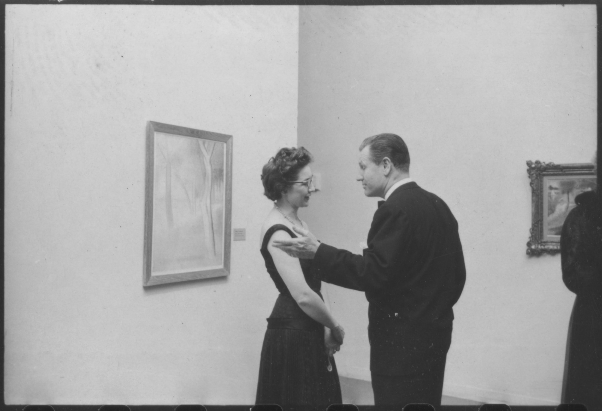 Nelson A. Rockefeller (right of center) and unidentified guests at the ...