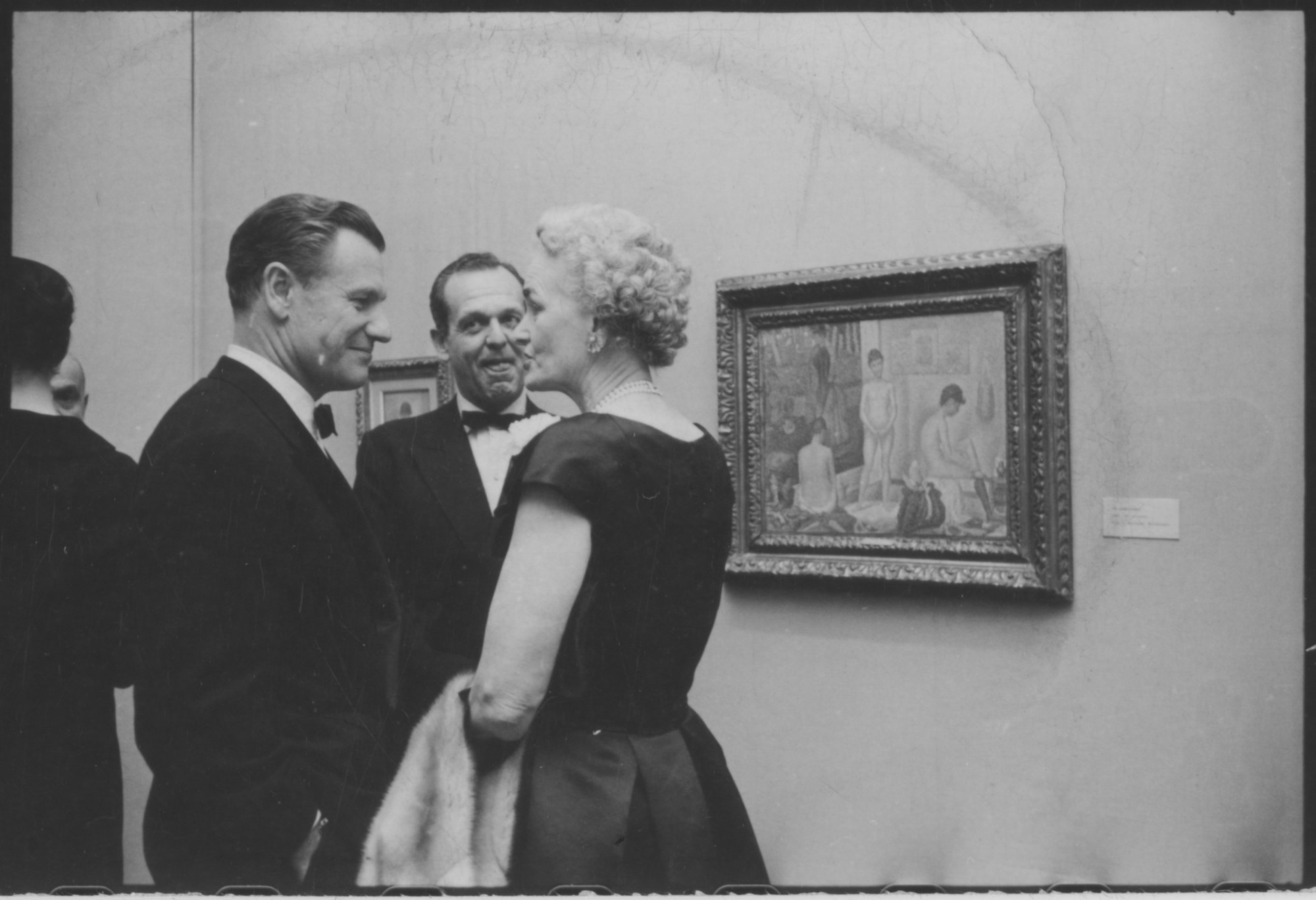 Nelson A. Rockefeller (left) and unidentified guests at the opening of ...