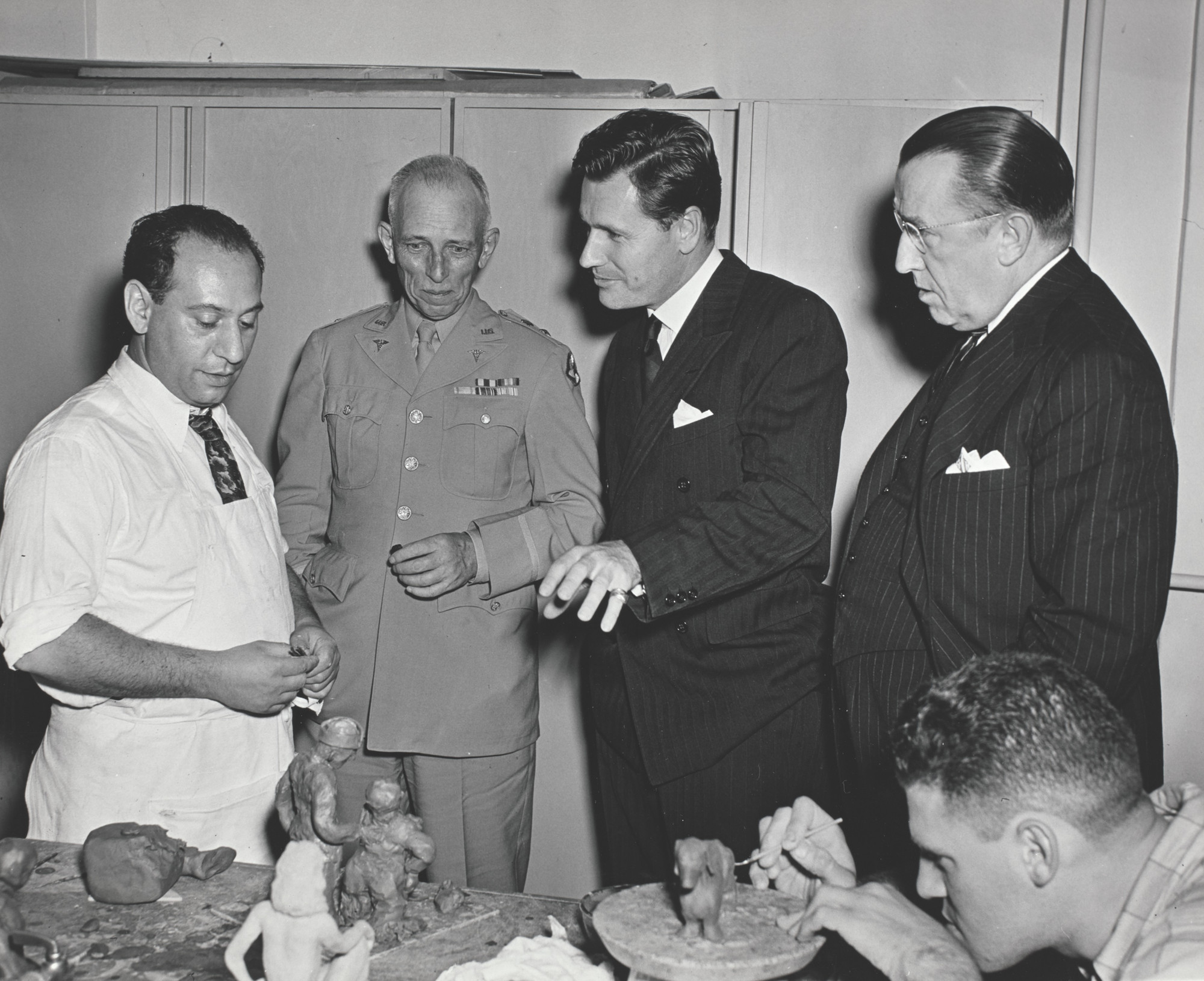 "left to right: veteran; Major General Norman T. Kirk, Surgeon General ...