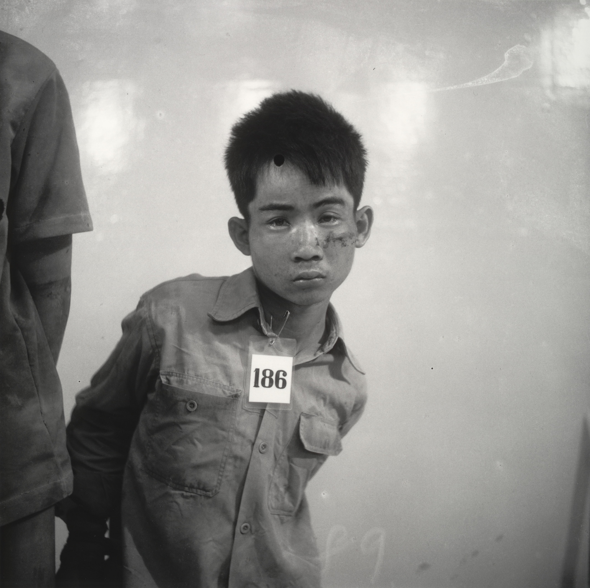 Nhem Ein, Unidentified photographer. Untitled (prisoner of the Khmer ...