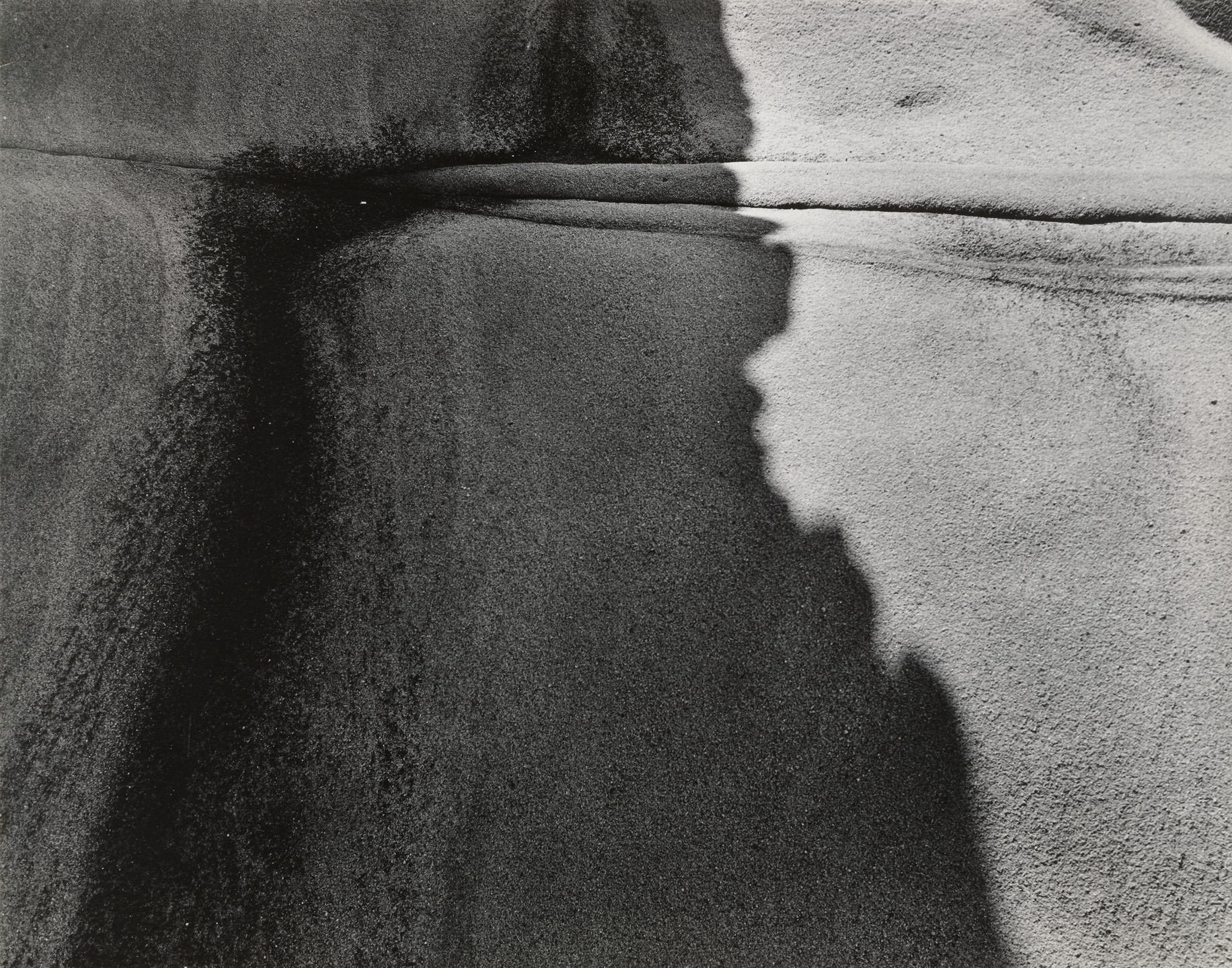 Minor White. Lobos Sandstone, Slit, and Shadow. 1949 | MoMA