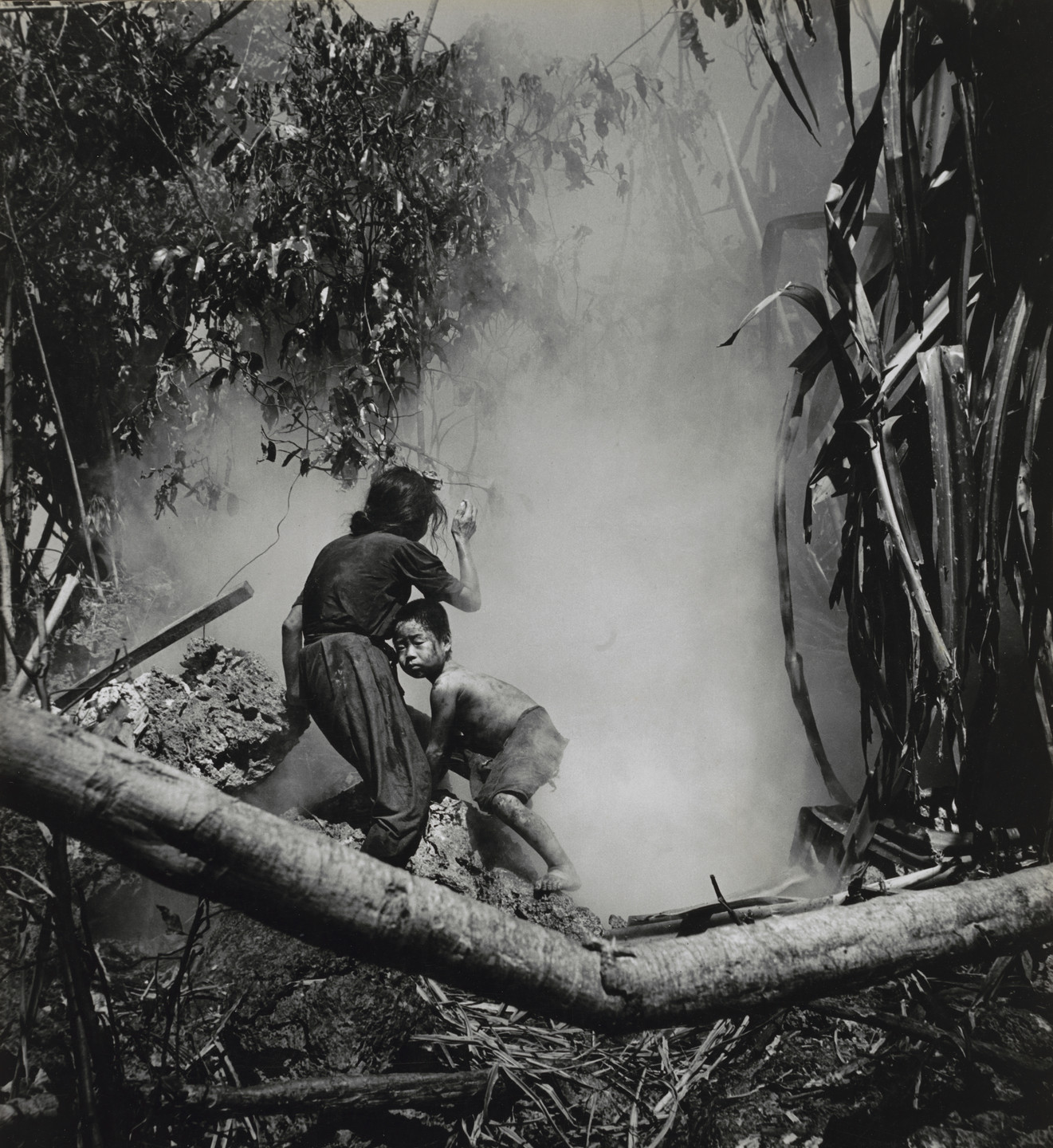 W. Eugene Smith. Saipan civilian smoked out of cave. 1944 | MoMA
