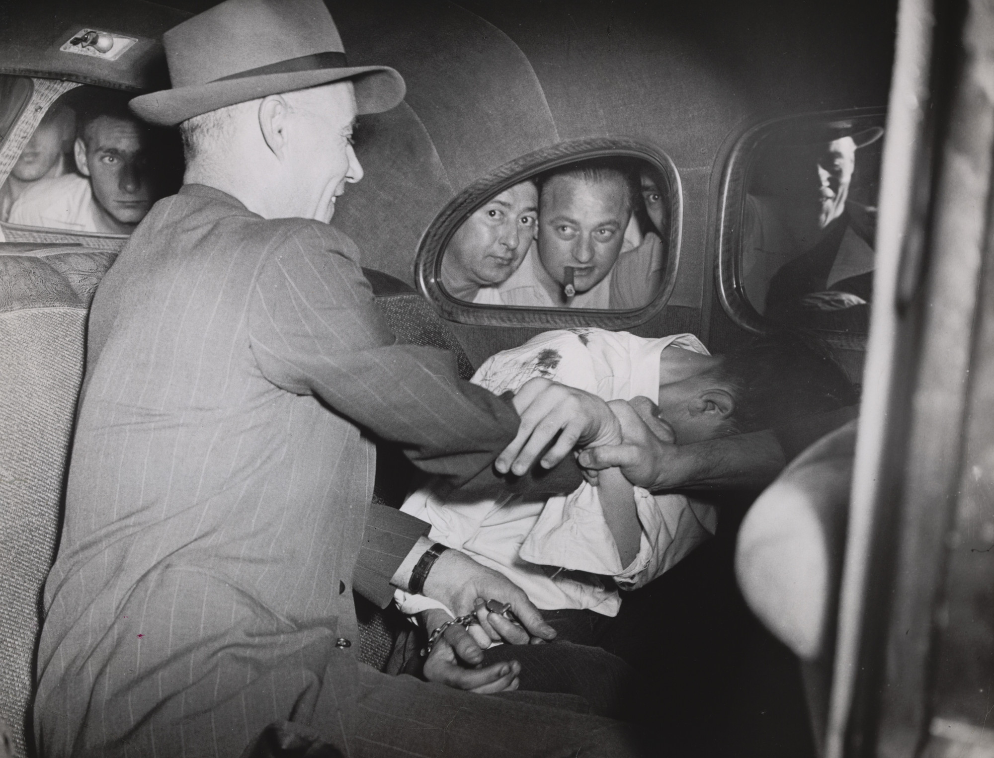Weegee (Arthur Fellig). Harold Horn, Knocked Over Milk Wagon with ...