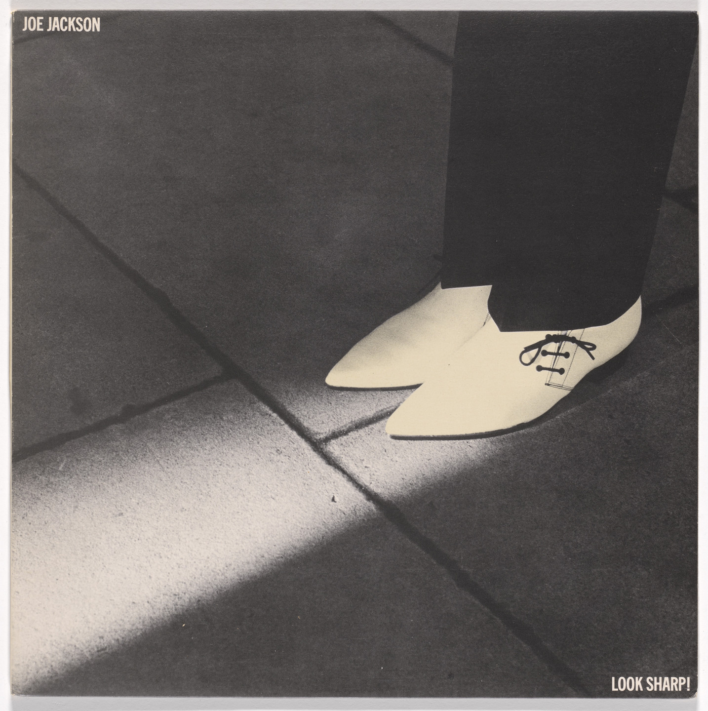 Michael Ross, Brian Griffin. Album cover for Joe Jackson, Look Sharp ...