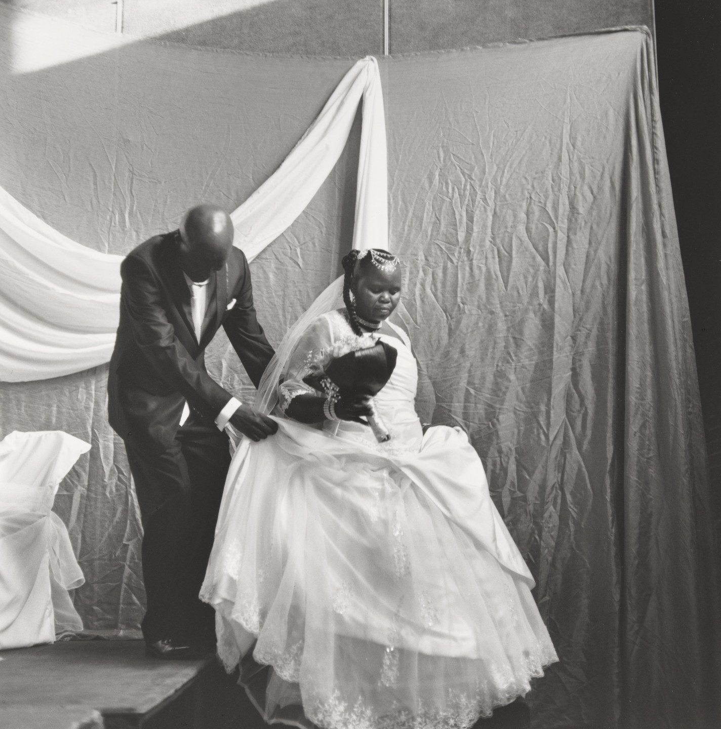 Sabelo Mlangeni. Sibongile Zasekhaya and Baba Nkosi’s wedding, Alexandra Community Hall. 2012 | MoMA